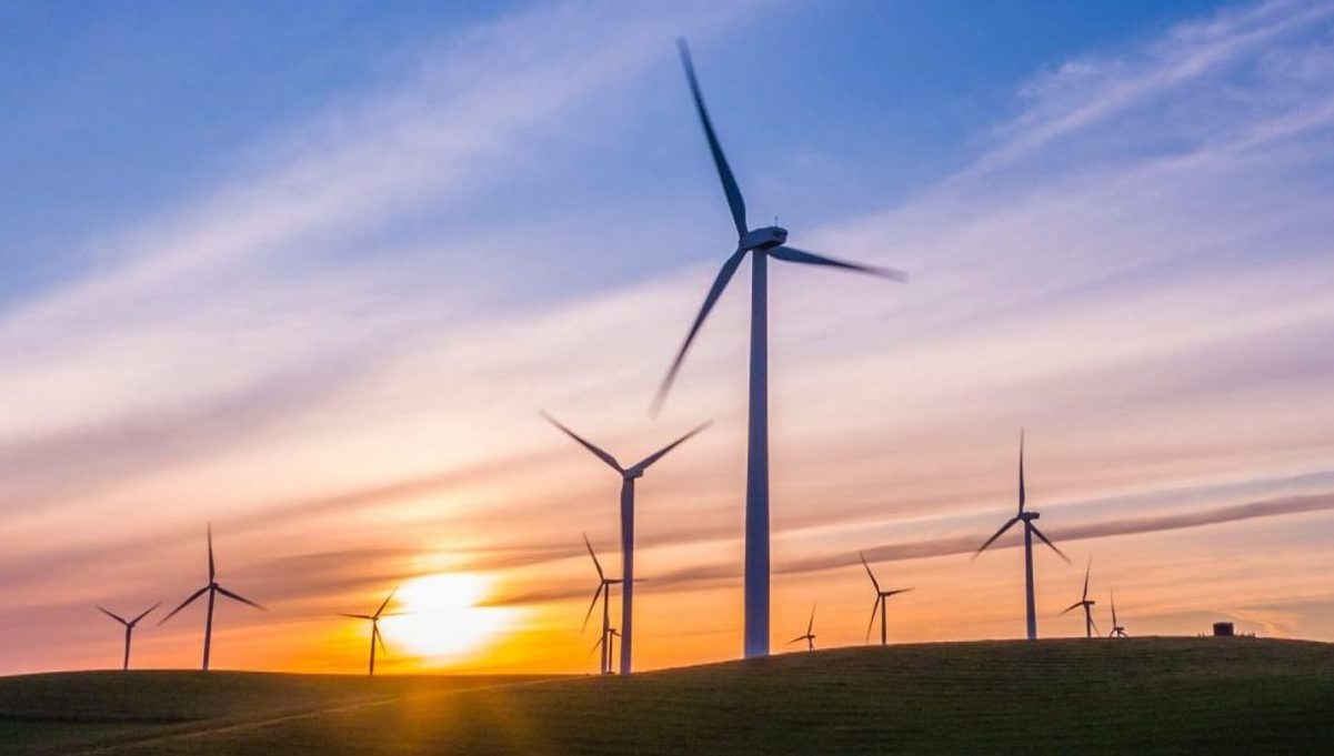 wind turbine sunset - Goldenset Capital Partners